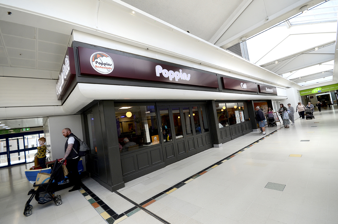 All smiles as popular Poppins restaurant reopens in Redditch after 14 ...